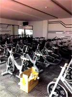 China Commercial 21kg Flywheel Spinning Bike with 150kg User Capacity and 55kg Weight for Gym Cardio Training for sale