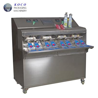 China KOCO 2021 competitive price water Expansion bag filling machine Small liquid filling for sale