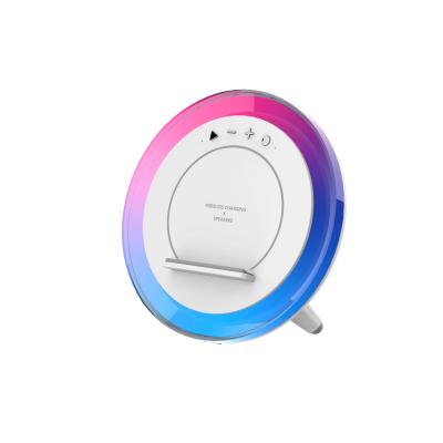 China 10W Wireless RGB Ambient Light Desktop Charger Multi Function Portable Wireless Speaker With Mobile Phone Holder for sale