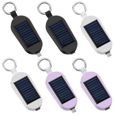 China Keychain Solar-Powered Power Bank with Hanging Buckle for Charging Phones and Watches in Emergencies for sale