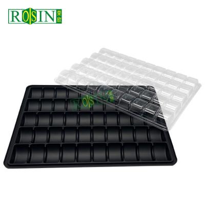 China Customized 50 cavity blister plastic PP black macaron container with transparent lid for sale