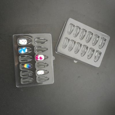 China Customized melon seed shaped 12 grid PET transparent vacuum formed Nail Tip storage display tray for sale
