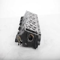 China Cast Iron Cylinder Head Assembly OEM Isuzu 4HK1 Cylinder Head Excavator Machinery Parts for sale