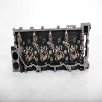 China Cast Iron Cylinder Head Assembly OEM Isuzu 4HK1 Cylinder Head Excavator Machinery Parts for sale