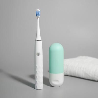 China Rechargeable Wholesale 4 Brush Heads Teeth Brush OEM Teeth whitening IPX7 Waterproof Electric Toothbrush for sale