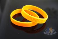 China Custom Gold PVC Wristbands Plastic Bracelets 212mm with Letters for sale