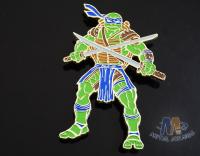 China Custom Logo Ninja Turtle Zinc Alloy Metal Lapel Pin Badge Cut Out Shiny Gold Plating 100pcs MOQ for sale