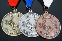China Custom 2D Level Round Sports Award Medals 63.5mm Zinc Alloy Recessed Textured Effect for sale