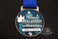 China Custom Zinc Alloy Award Medals 63.5mm Antique Silver Plating with Ribbon for sale