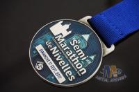 China Custom Zinc Alloy Award Medals 63.5mm Antique Silver Plating with Ribbon for sale