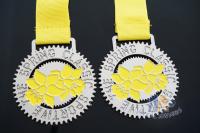 China Custom Cut Out Design Glitter Color Metal Award Medals 65mm Gold Plating with Printing Ribbon for sale