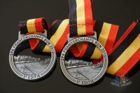 China Custom Zinc Alloy Sports Medal 50mm Cut Out Design with Strip Ribbon Antique Silver for sale