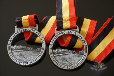 China Custom Zinc Alloy Sports Medal 50mm Cut Out Design with Strip Ribbon Antique Silver for sale