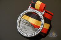 China Custom Zinc Alloy Sports Medal 50mm Cut Out Design with Strip Ribbon Antique Silver for sale