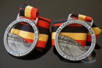 China Custom Zinc Alloy Sports Medal 50mm Cut Out Design with Strip Ribbon Antique Silver for sale