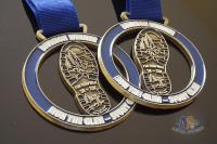 China Custom Zinc Alloy Sports Medal 50mm Cut Out Design Soft Enamel Antique Gold Plating for sale