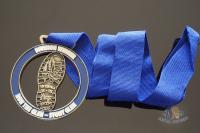 China Custom Zinc Alloy Sports Medal 50mm Cut Out Design Soft Enamel Antique Gold Plating for sale