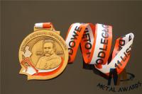 China Custom 3D Mold Relief Soft Enamel Medals Personalized Shape 60mm x 3mm Antique Gold Plated for sale