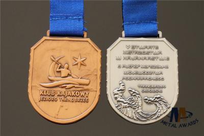 China Antique Plating Embossed Custom Engraved Medals Iron Material Durable for sale