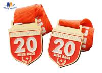 China Custom Peltate Shape Running Race Medals Shiny Gold Plating 56mm One Color Printed Ribbon for sale