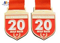 China Custom Peltate Shape Running Race Medals Shiny Gold Plating 56mm One Color Printed Ribbon for sale