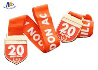 China Custom Peltate Shape Running Race Medals Shiny Gold Plating 56mm One Color Printed Ribbon for sale
