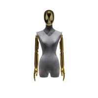 China Female mannequin with a gold plated arm and a half body covering for sale