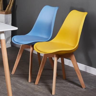 China Wooden Legs Modern Heavy-Duty Plastic Dining Chairs with Soft Cushion Seat Lounge Chair Set for Home Office Kitchen Room for sale