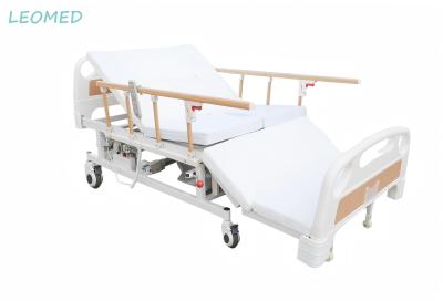 China Electric Turning Care Bed Triple Electric Adjustment 1080mm Wide Optional Wooden Headboard for sale