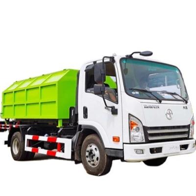 China Customized Hook Lift Waste Compactor Truck 4x2 With 7CBM 9 CBM Garbage Boxes for sale