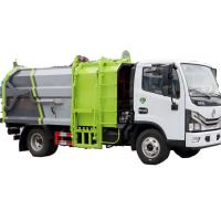 China 4x2 6 Wheels 6 CBM Compactor Garbage Truck With Sidecar Hitch Bucket for City Road for sale