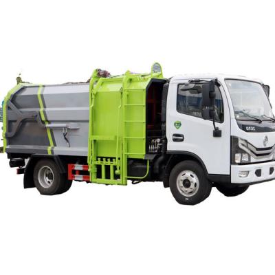 China 4x2 6 Wheels 6 CBM Compactor Garbage Truck With Sidecar Hitch Bucket for City Road for sale