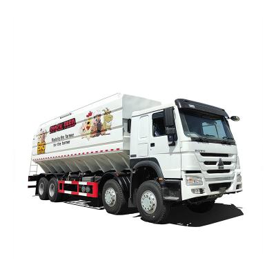 China Sinotruk LHD RHD Livestock Feed Truck Animal 6X4 Bulk Feed Truck for sale