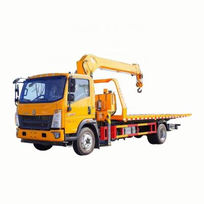 China 4 * 2 HOWO  5 Tons Road Rescue Trailer With 5 Tons Crane Wrecker With 5 Tons 4 Section Arm   Straight  Arm	 Crane Mounted Truck for sale