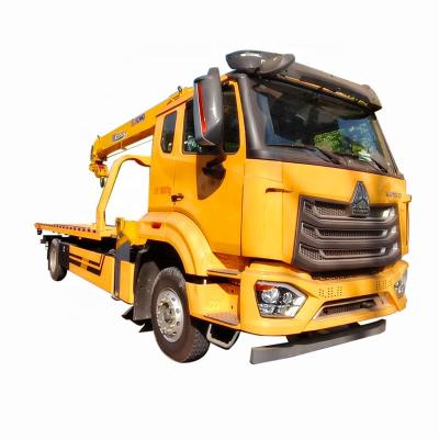 China HTC Howo 10 Tons Flat Wrecker With 8 Tons 4 Section Arm Crane     Tractor With Crane  Roollback  With Crane for sale