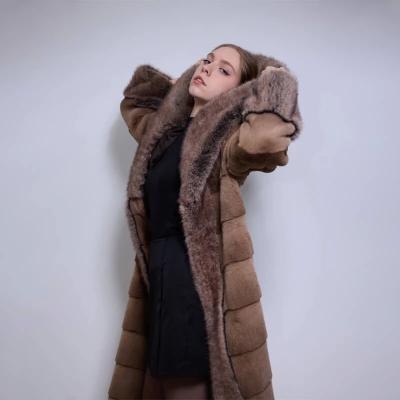 China Fashion Retail Women'S Fluffy Hood Faux Fur Coat Long Overcoat for sale