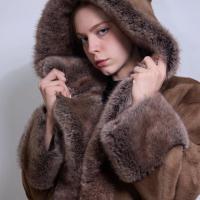 China Fashion Retail Women'S Fluffy Hood Faux Fur Coat Long Overcoat for sale
