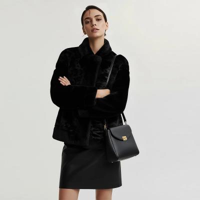 China Side Pockets Faux Fur Jacket Short Exquisite Coat Soft Black Fluffy Jacket for sale