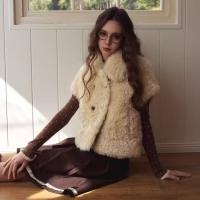 China Warm Room Short Sleeved Retro Double Breasted Faux Sheepskin Vest for sale