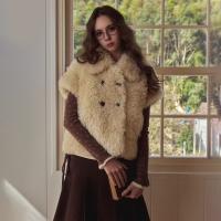 China Warm Room Short Sleeved Retro Double Breasted Faux Sheepskin Vest for sale