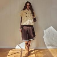 China Warm Room Short Sleeved Retro Double Breasted Faux Sheepskin Vest for sale