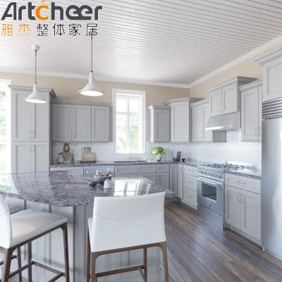 China Eco-Friendly White Shaker Kitchen Cabinet with 5-Year Warranty and Custom Size for Modern Homes for sale