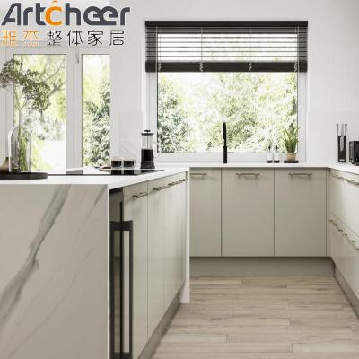 China Modern Luxury Kitchen Cabinet with Electric Lift System Custom Size L Shape Cabinet in Eco-Friendly Material for sale