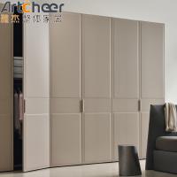 China Italian Design Wardrobe with Faux Leather Doors and Customized Size for Modern Bedrooms for sale