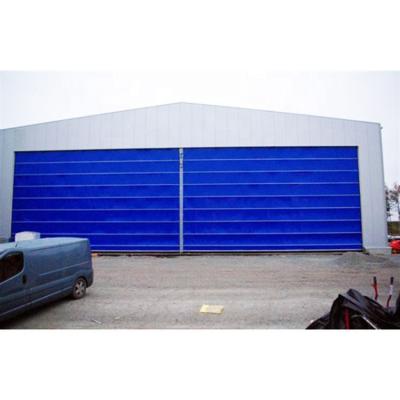 China Heavy Duty Upward Acting Hangar Door For Industrial Facilities Vertical Access for sale