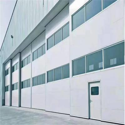 China Electric Drive Steel Hangar Sliding Door Wide Span Access Sliding Warehouse Door for sale