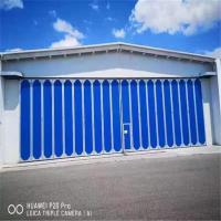 China Electric Multi Panel Folding Industrial Door With Fire Proofing Adjustable Speed 0.1-0.5 M/S for sale