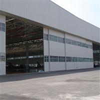 China Horizontal Steel Bottom Rolling Hangar Door Multi Panel Sliding System Remote Controlled for sale