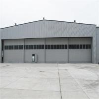 China Hydraulic Powered Swing Hangar Door Heavy Duty Steel Pivot Style Door System for sale
