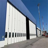 China Large Multi Leaf Folding Industrial Door Wide Span Fold Up Hangar Door Weather Sealing for sale